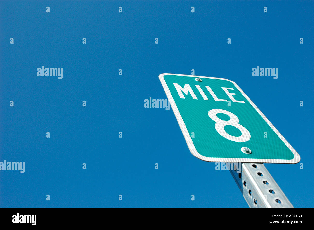 8 eight mile distance marker sign on freeway highway Stock Photo - Alamy