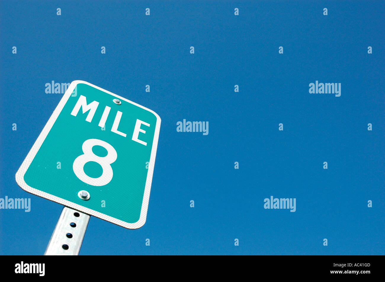 8 eight mile distance marker sign on freeway highway Stock Photo - Alamy