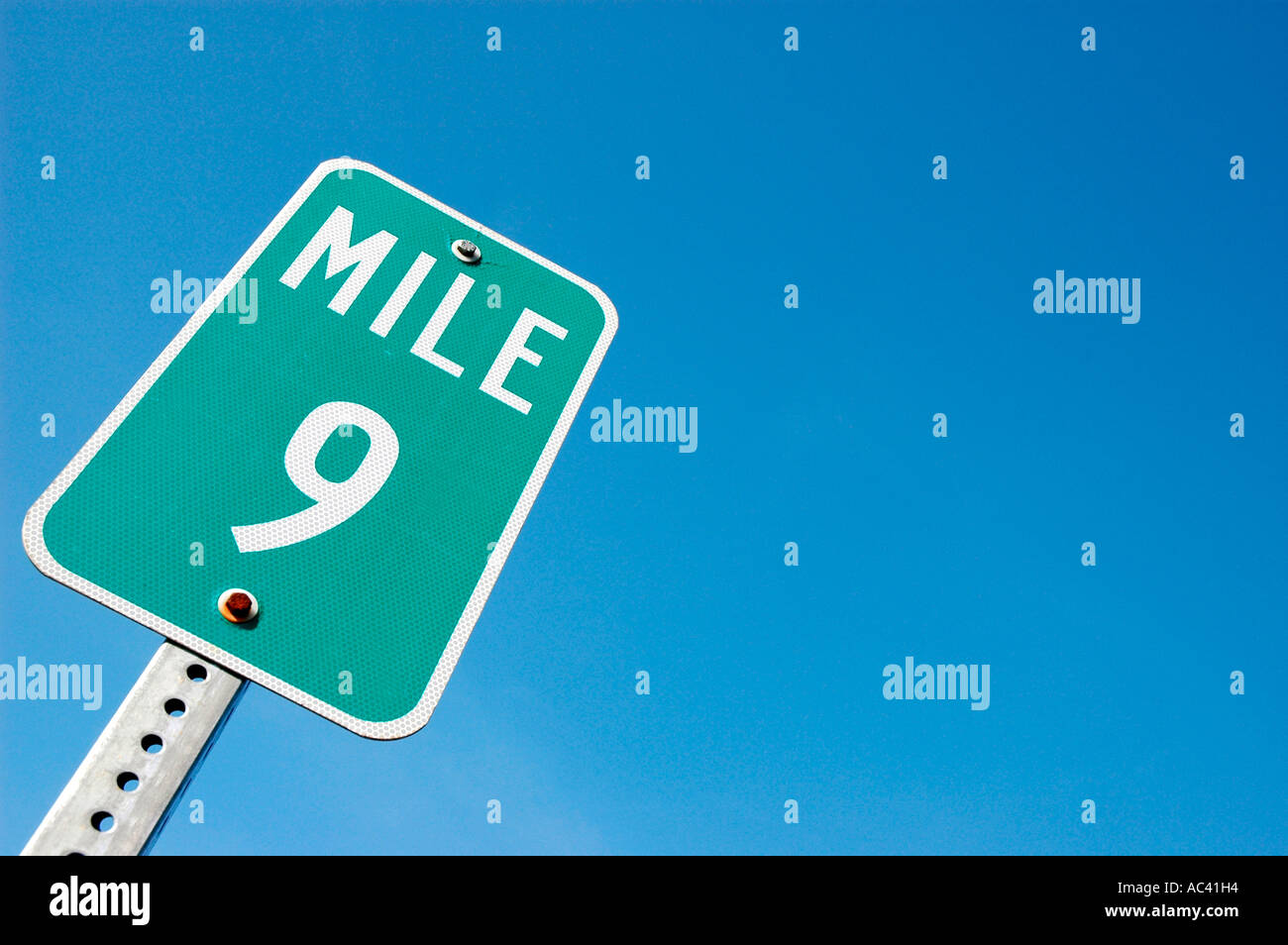 9 nine mile distance marker sign on freeway highway position Stock ...
