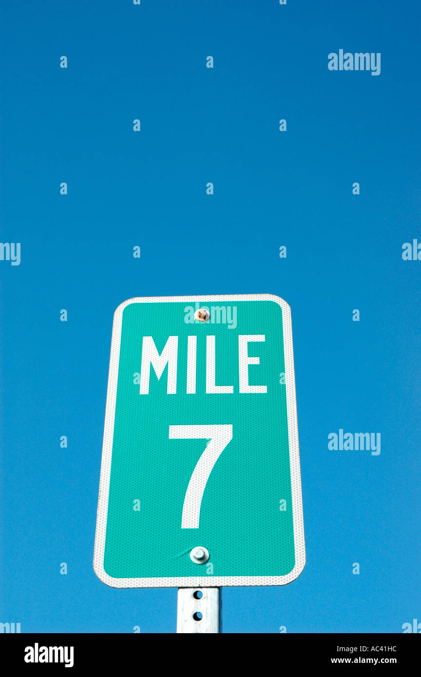 7 seven mile distance marker sign on freeway highway number Stock Photo ...