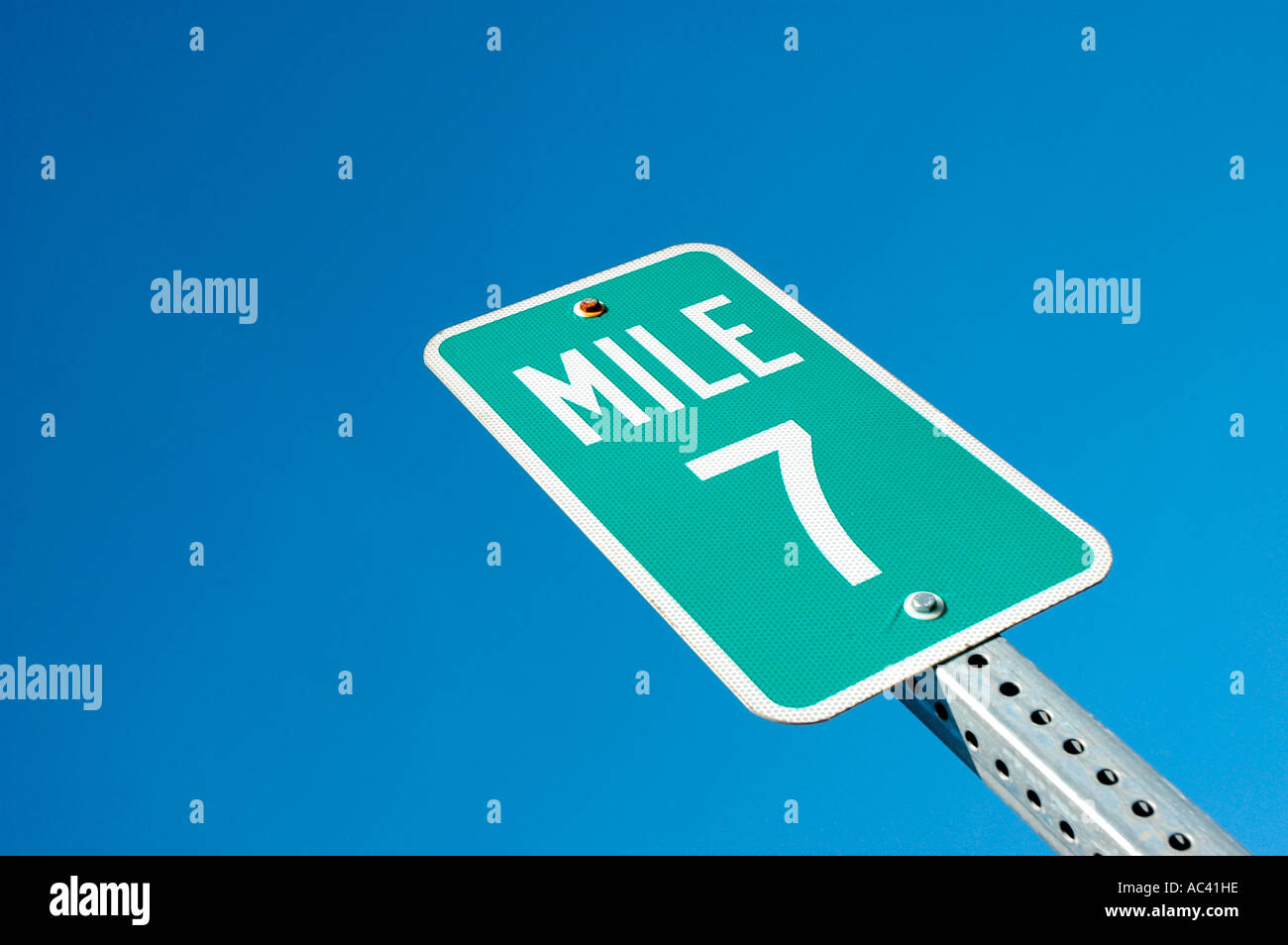 7 seven mile distance marker sign on freeway highway number Stock Photo ...