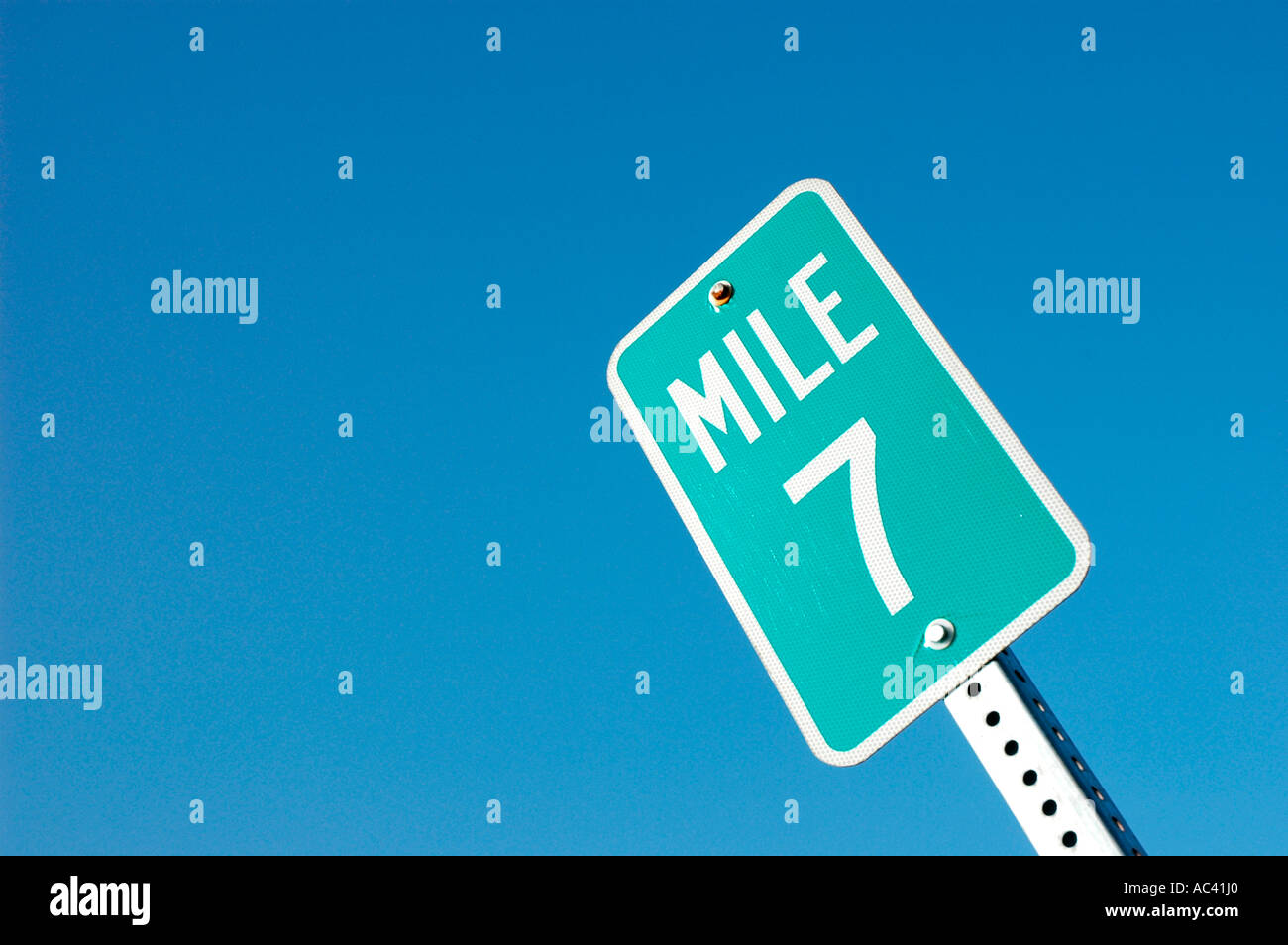 7 seven mile distance marker sign on freeway highway number Stock Photo ...
