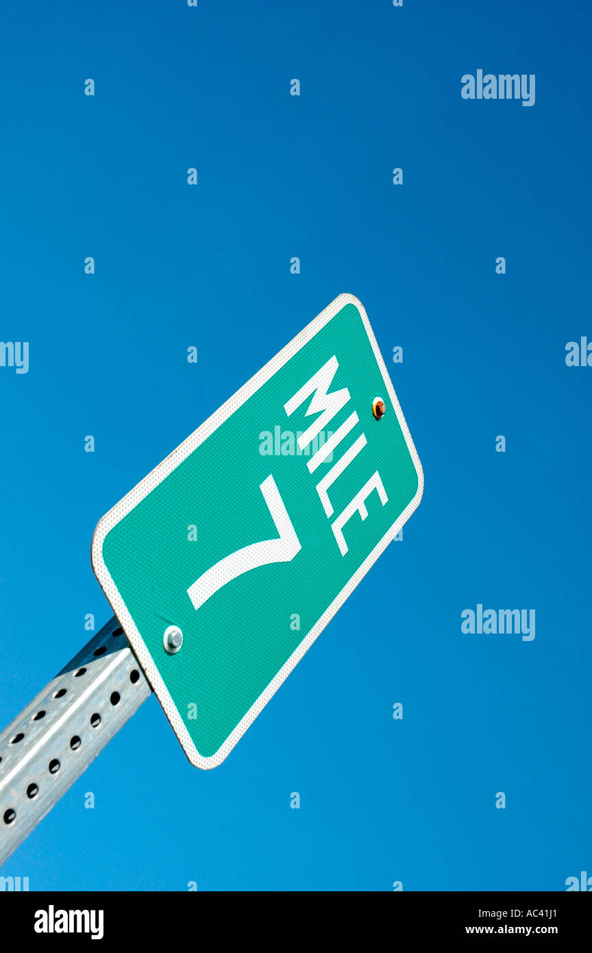 7 seven mile distance marker sign on freeway highway number Stock Photo ...