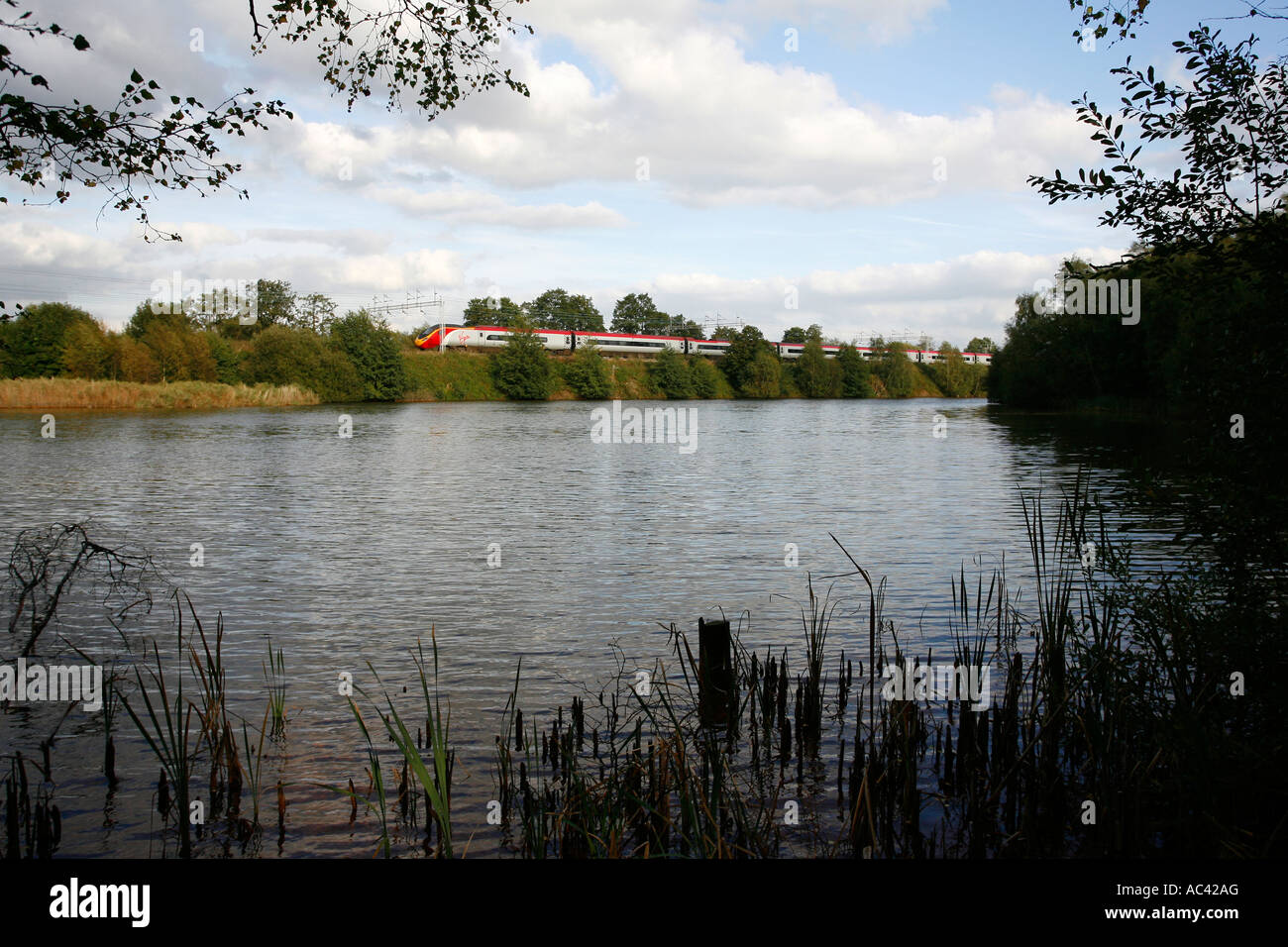 Virgin Train Alvecote Pools Warwickshire England UK Stock Photo - Alamy