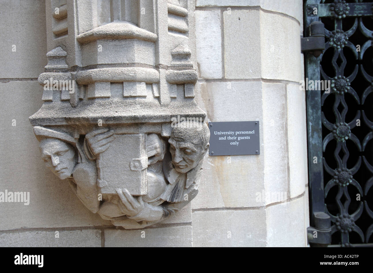 New Haven, CT. Yale University Stone carving and sign in front of an ...