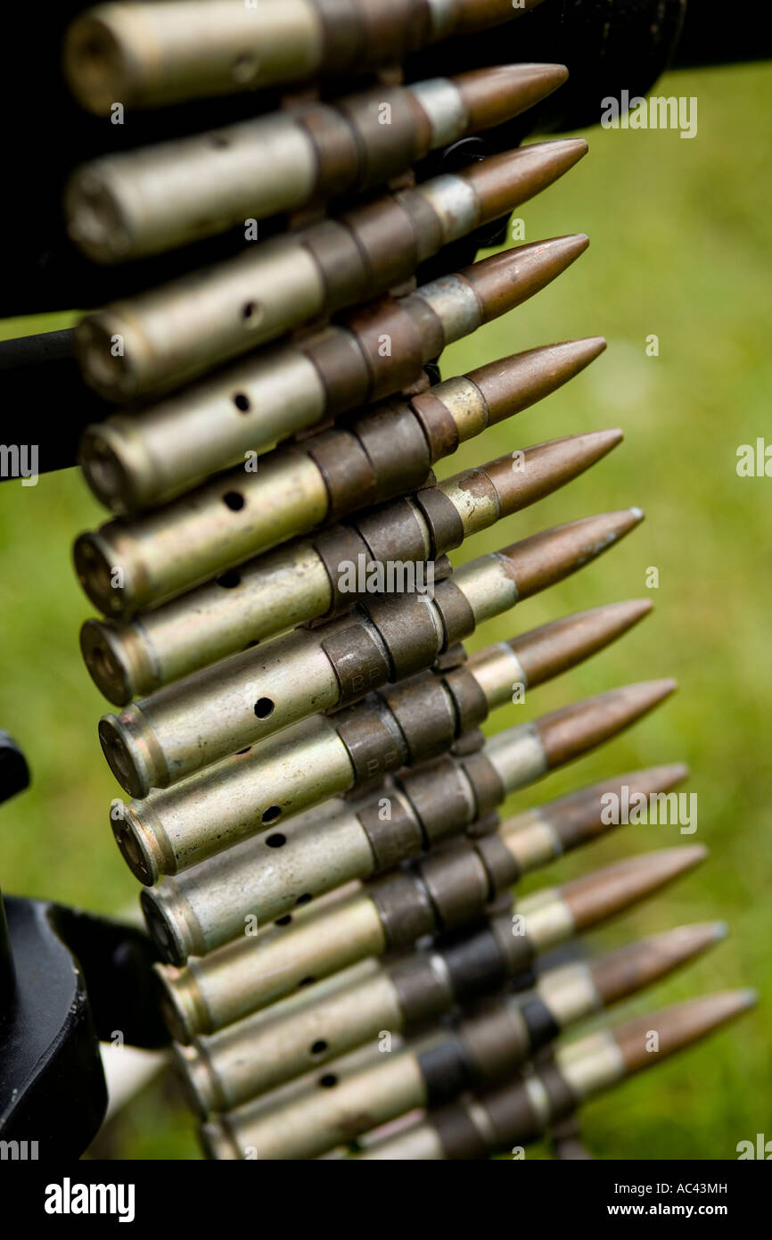 Up brass old machine gun 50 caliber aircraft bullets belt hi-res stock ...