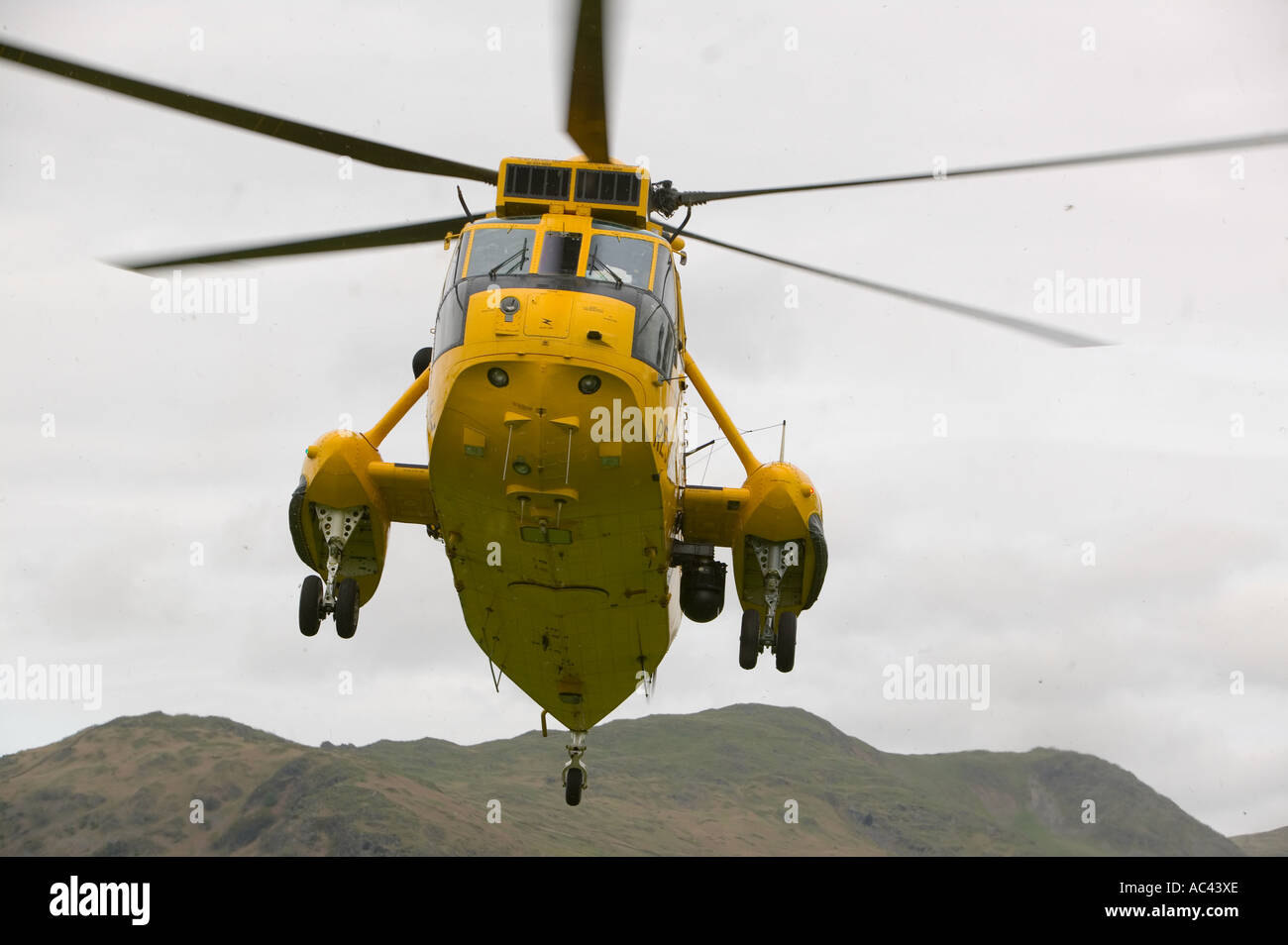 RAF Sea King Helicopter coming into land on a mountain rescue mission ...
