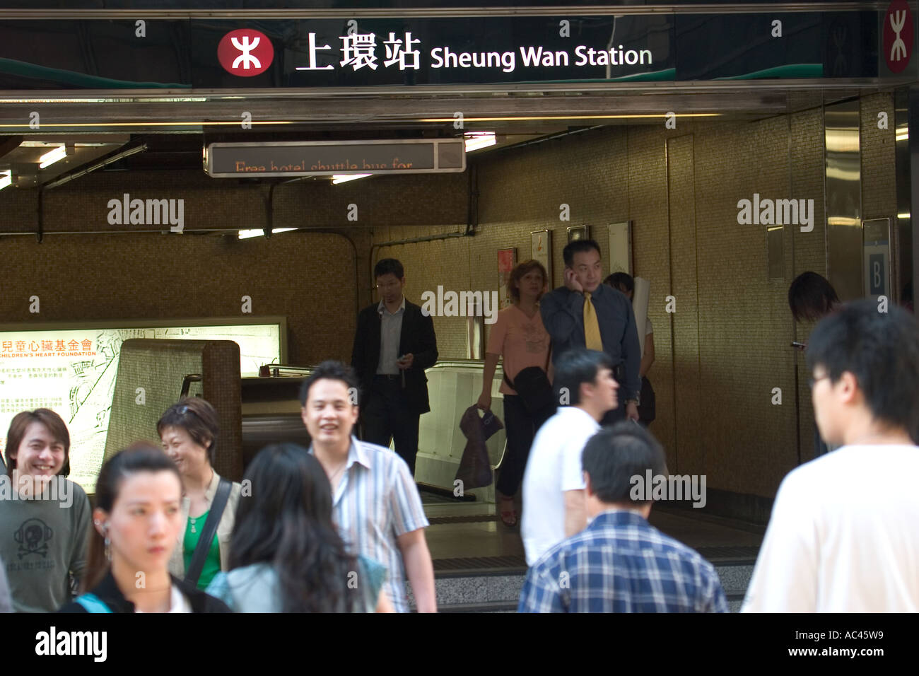 Entrance to Sheung Wan MTR Station Exit people traffic foot Hong Kong ...