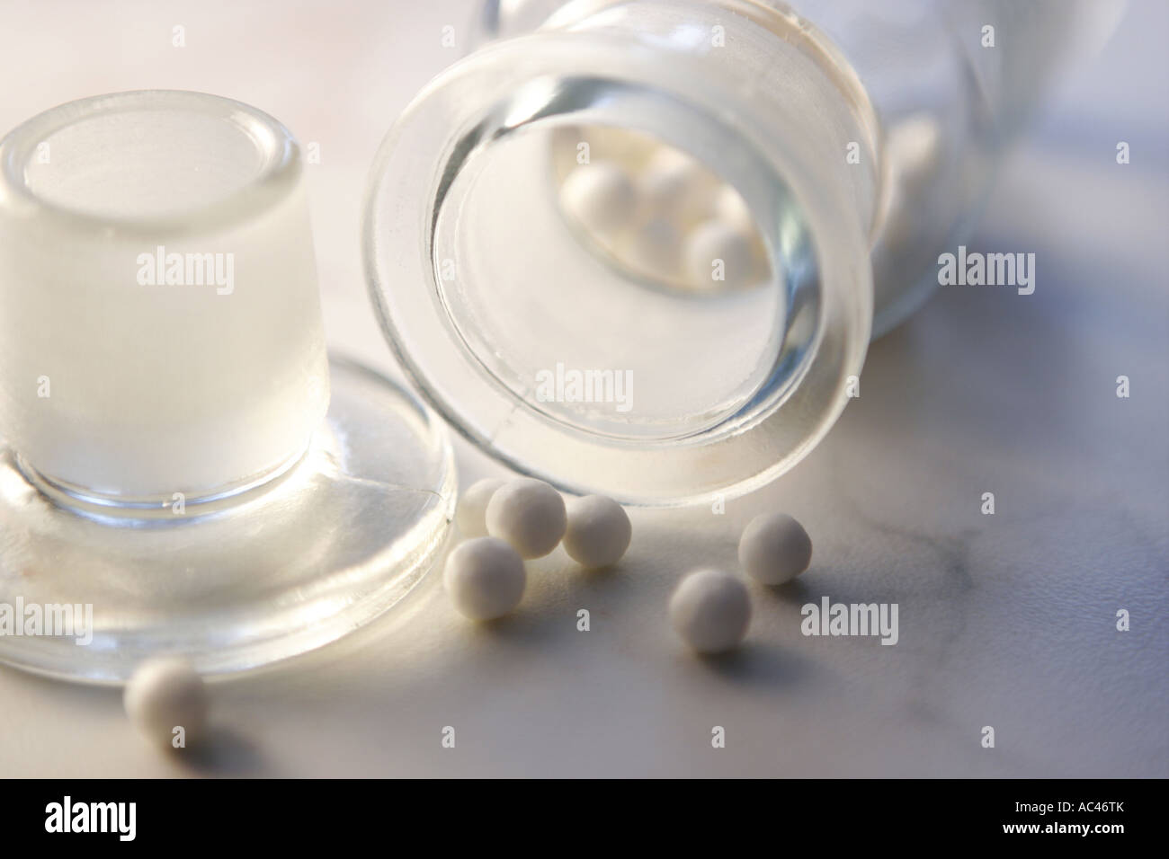 Homeopathic pills in bottle Stock Photo - Alamy