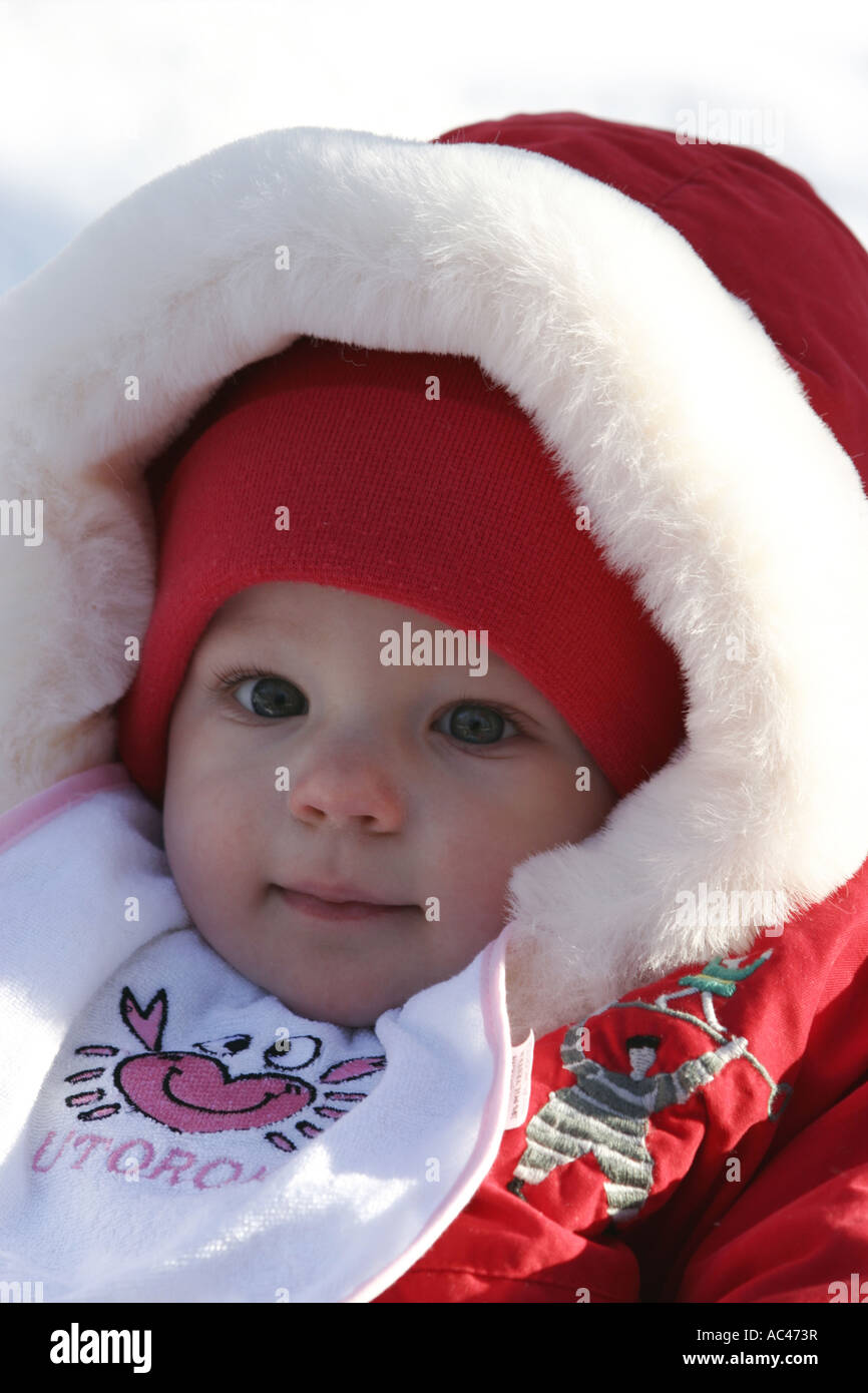 Baby face in winter Stock Photo - Alamy
