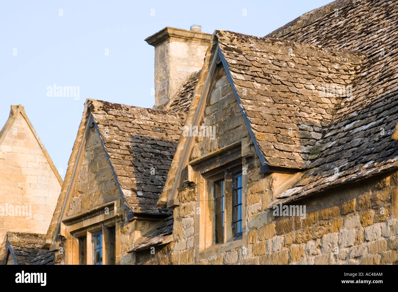 Dormer window on a stone cottage in the Cotswold village of Stanton ...