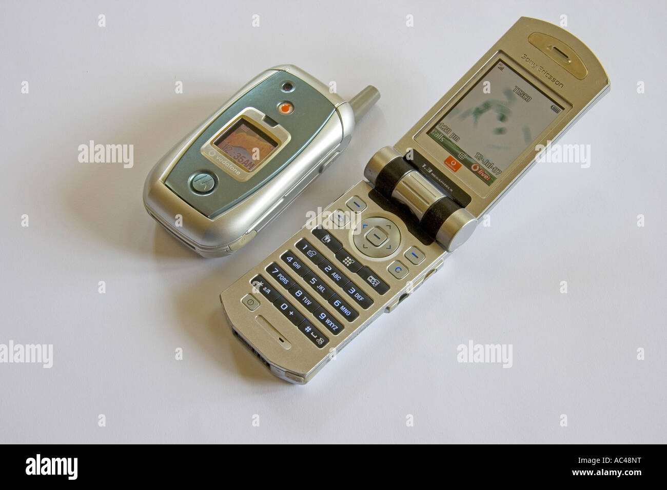 A close up of two cell phones Stock Photo - Alamy