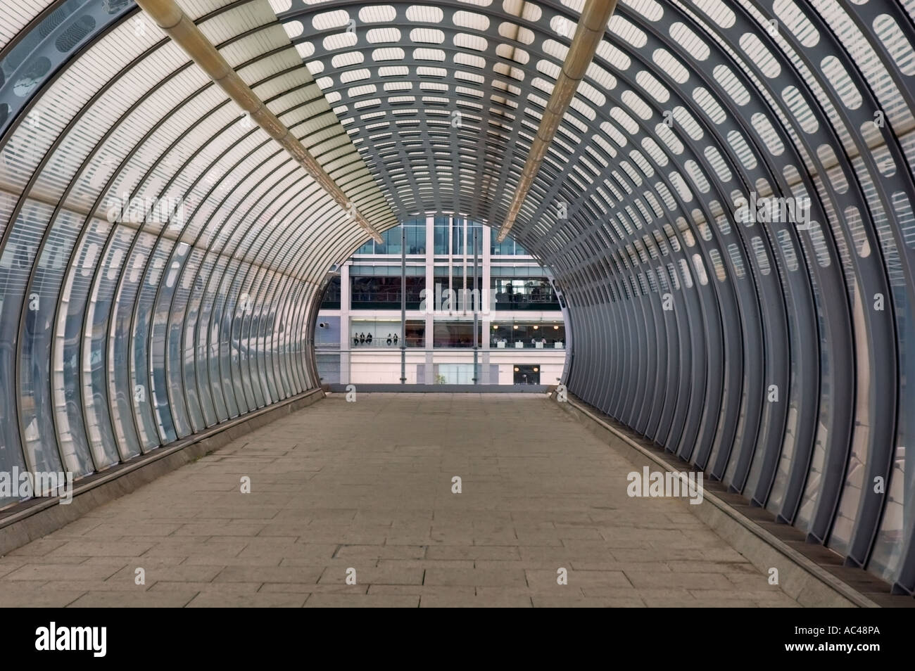 Looking towards Canary Wharf office building from the walkway at Poplar ...