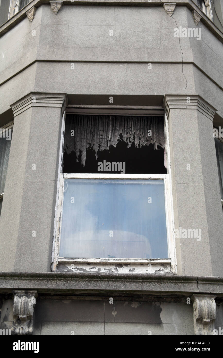 Derelict house and open window Stock Photo - Alamy