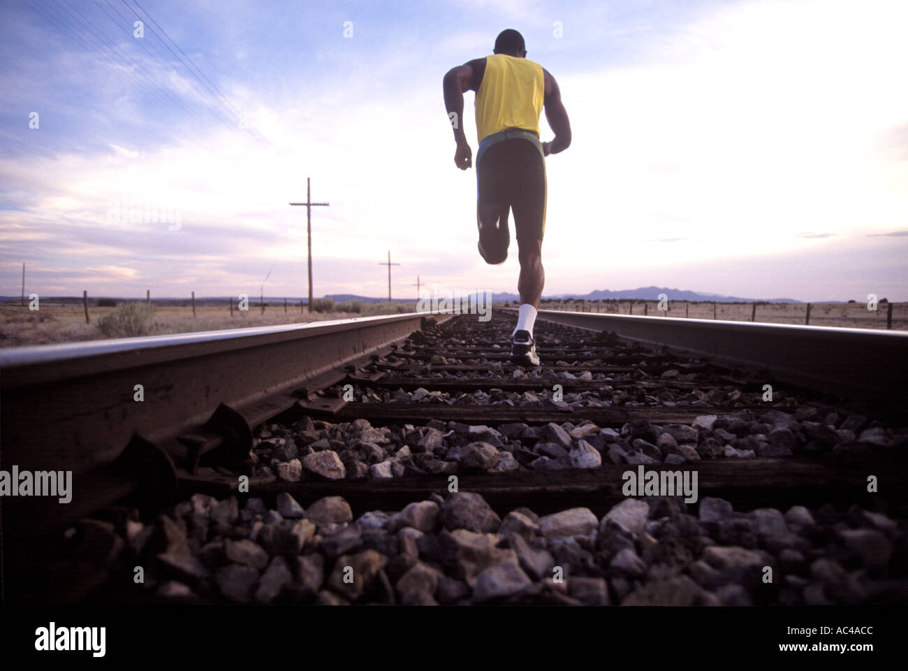 Man running railroad tracks hi-res stock photography and images - Alamy