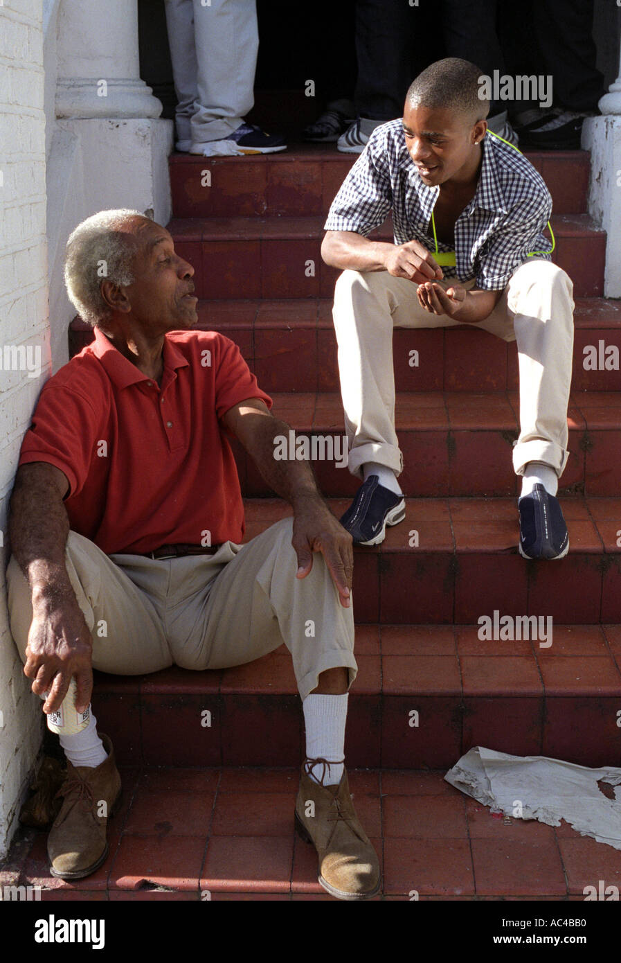 Black men talking caribbean hi-res stock photography and images - Alamy