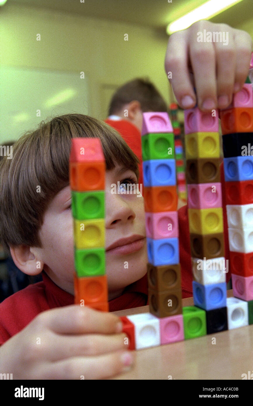 Child counting blocks hi-res stock photography and images - Alamy