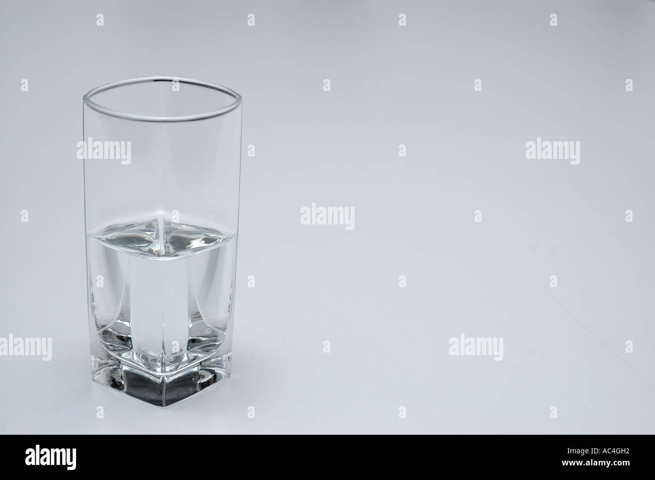 glass half full half empty Stock Photo - Alamy