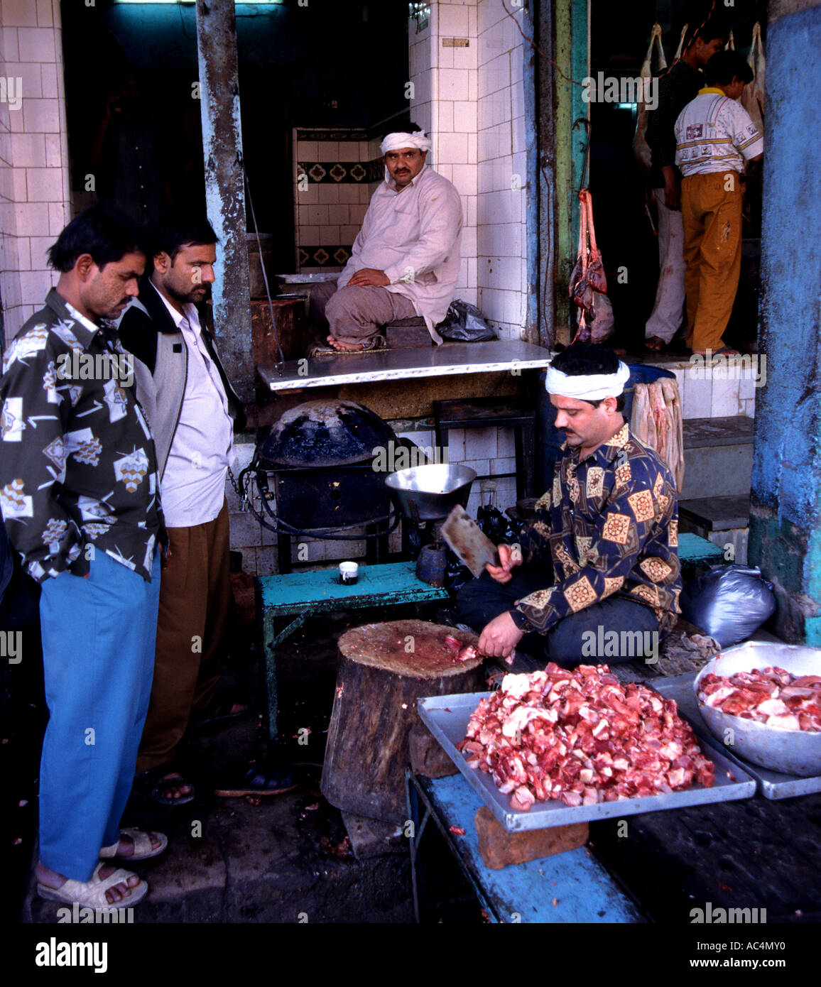 Old Delhi India food market busy shop people meat Stock Photo - Alamy