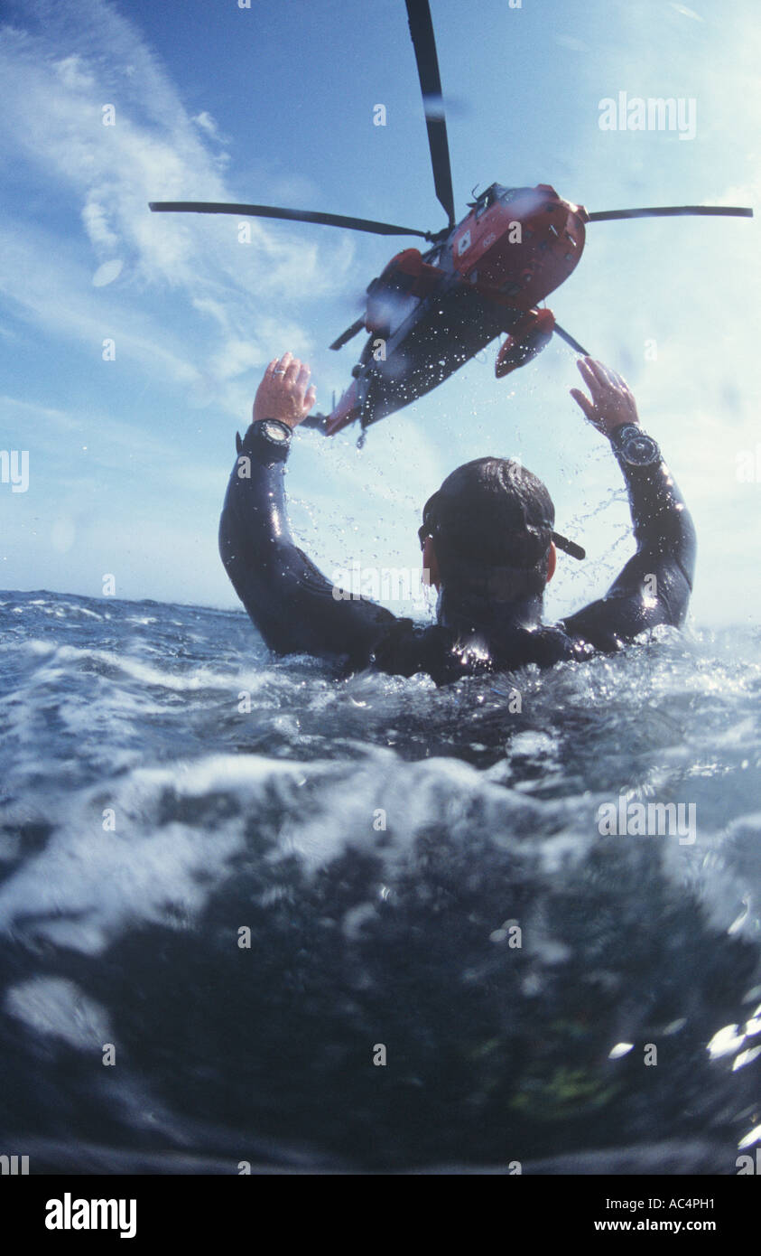 Royal Navy helicopter from Culdrose with Search and Rescue diver Stock ...
