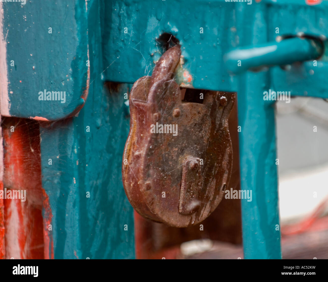 Rusty Old English Padlock on Gate Stock Photo - Alamy