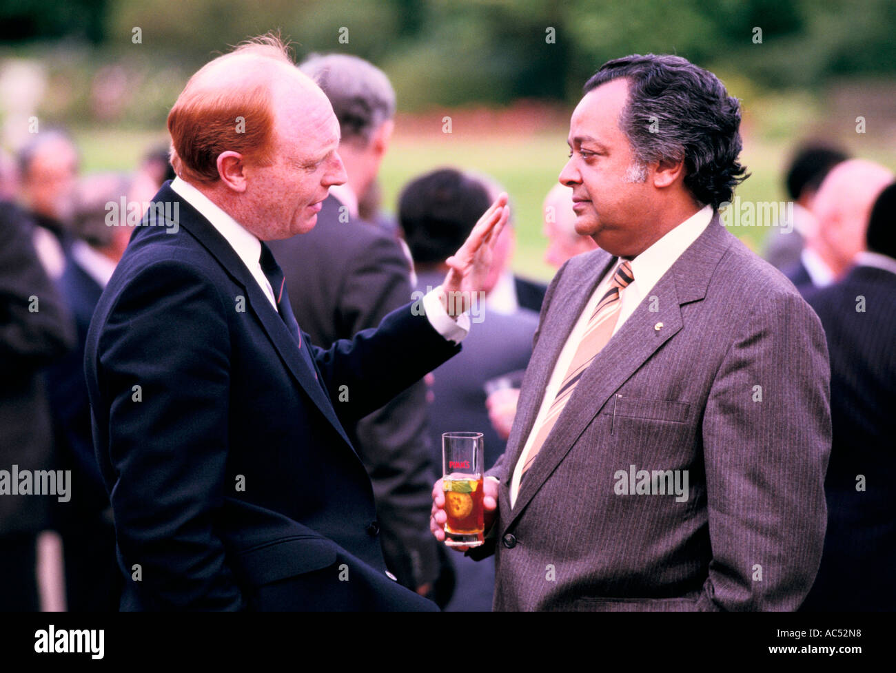 Smiling politician with red tie hi-res stock photography and images - Alamy