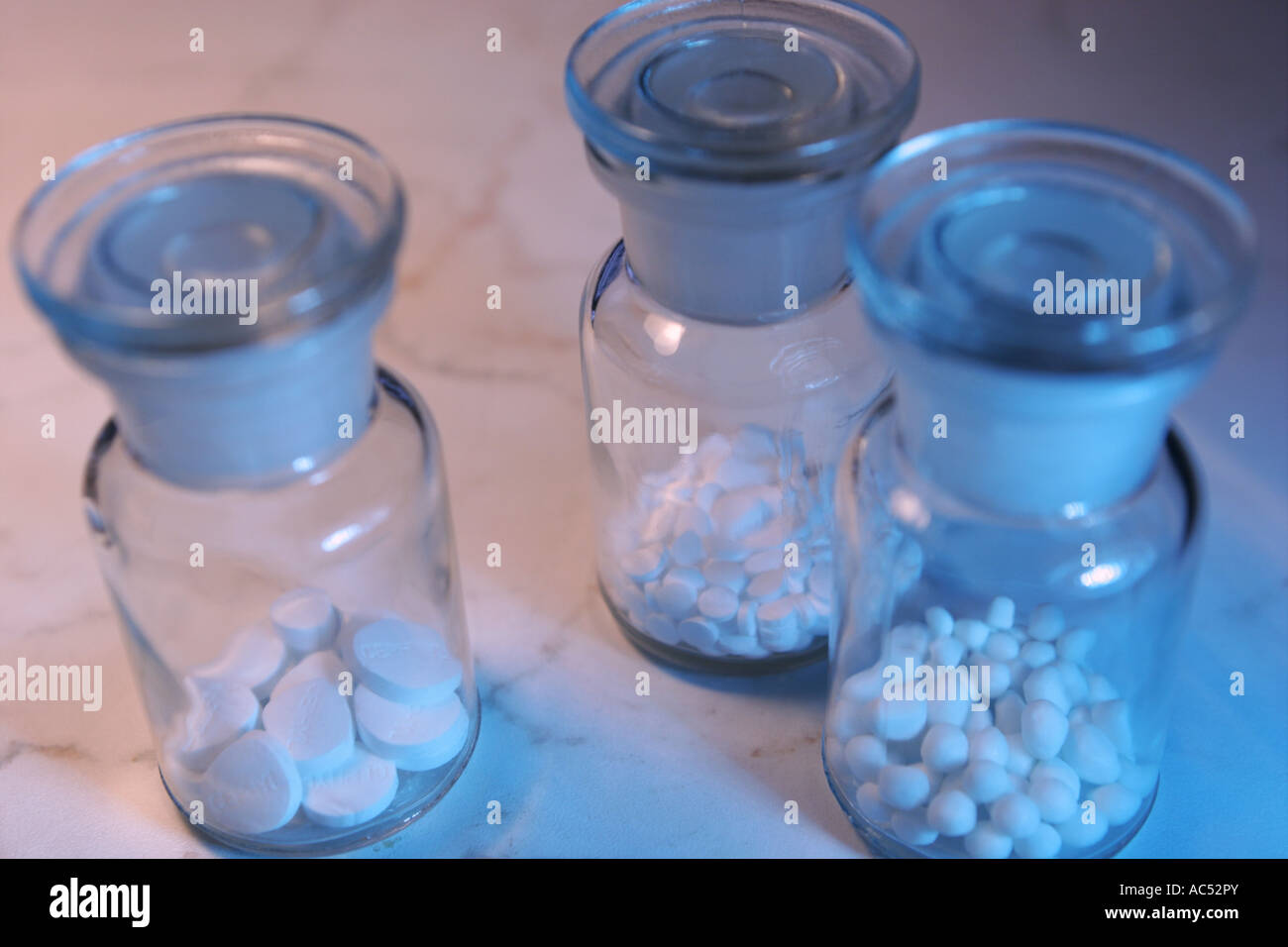 Homeopathic pills in glass bottles Stock Photo - Alamy