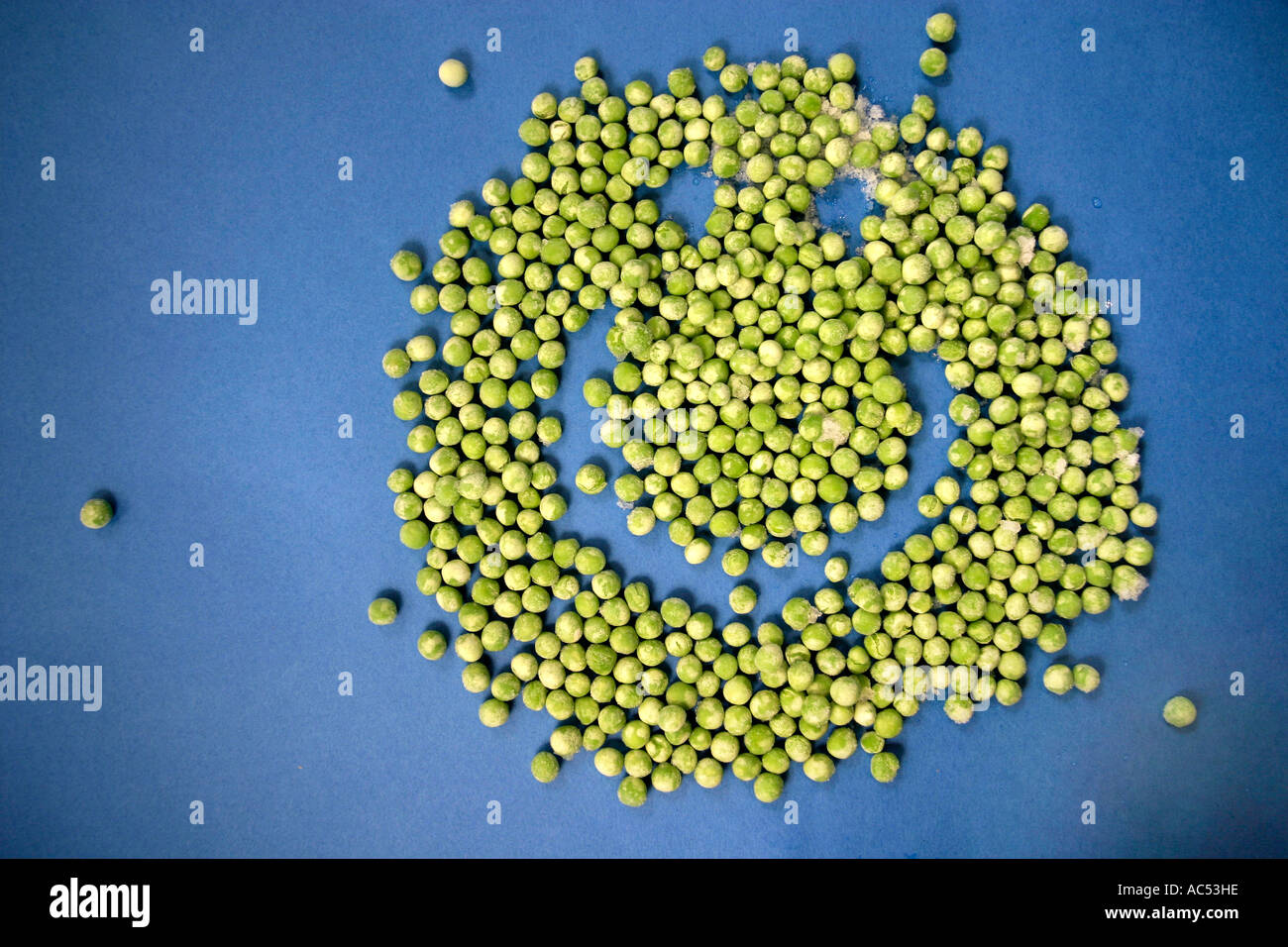 Funny face made from peas Stock Photo - Alamy