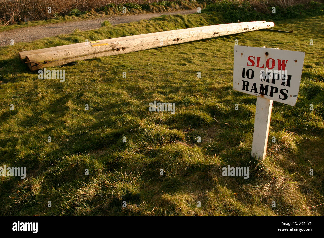 Ramps sign with telegraph poles Stock Photo - Alamy