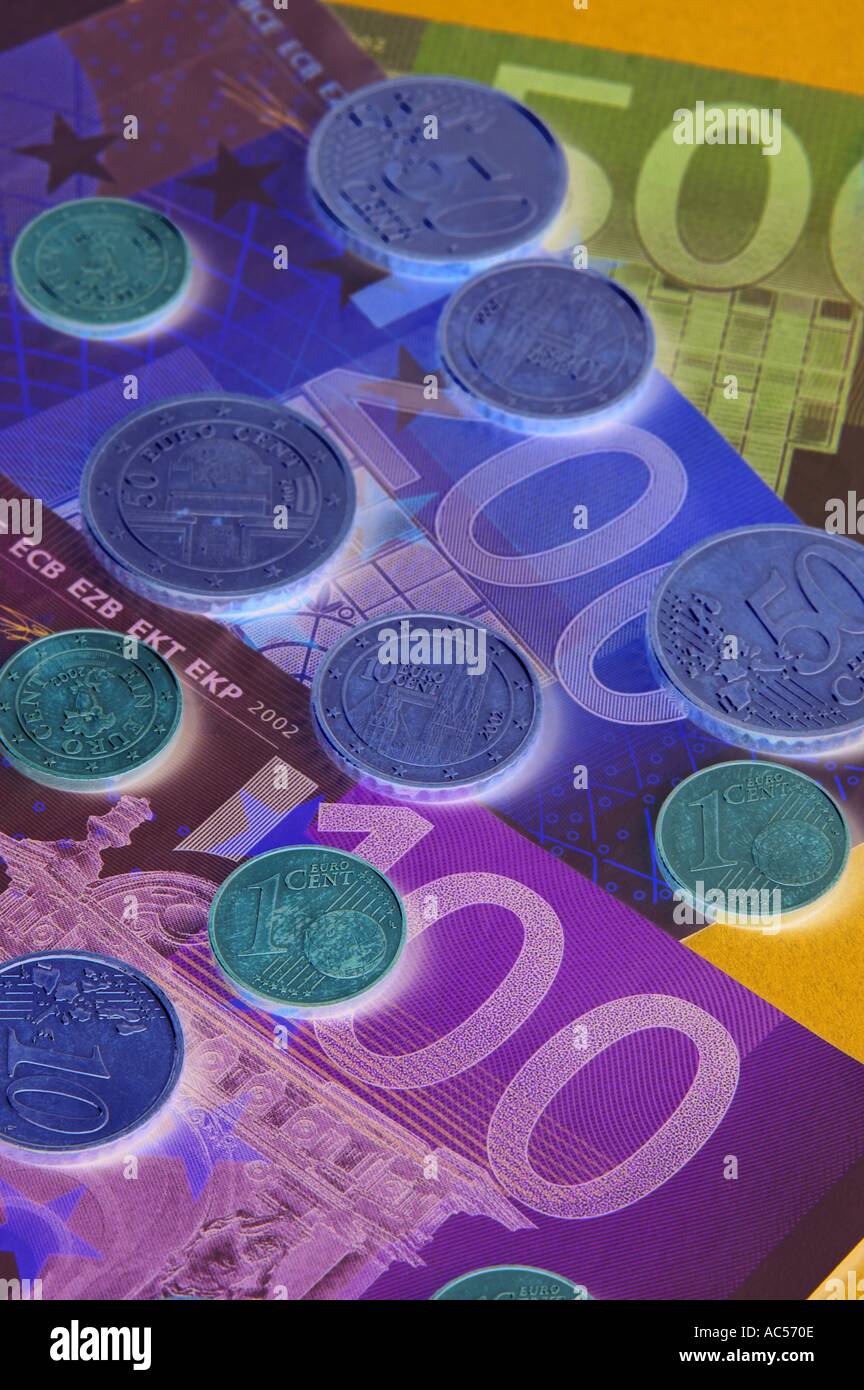 Business coins euros money notes work working Stock Photo - Alamy