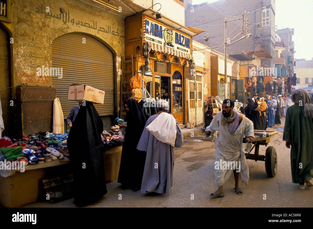Cairo street scene traditional dress hi-res stock photography and ...