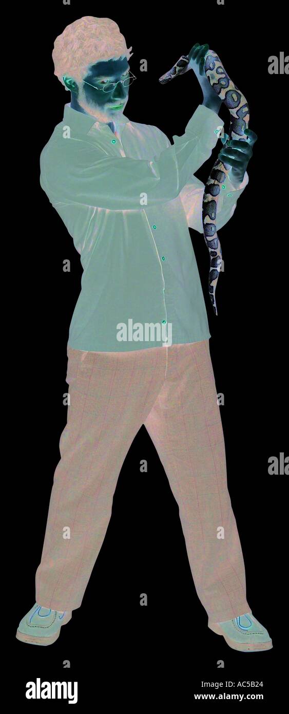 Man holding snake hi-res stock photography and images - Alamy