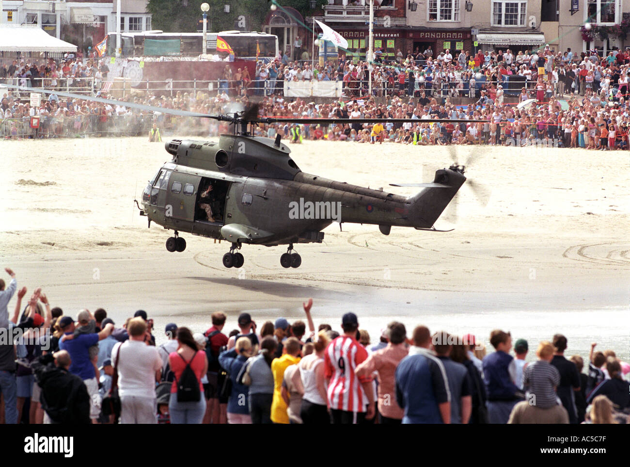 Navy Puma Helicopter lands on a beach during a display Stock Photo - Alamy