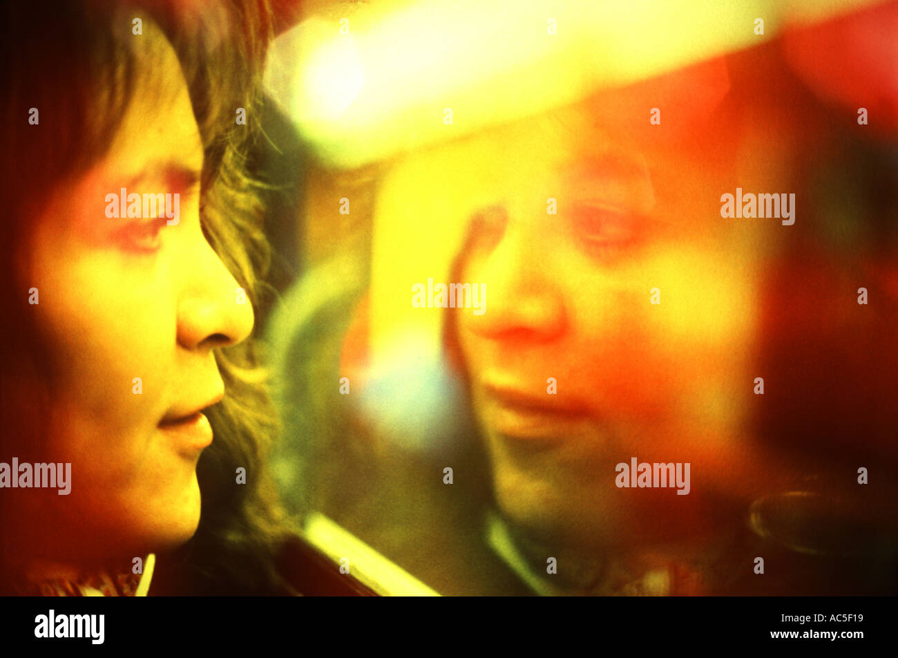 girl seeing looking herself in reflection window startled surpised ...