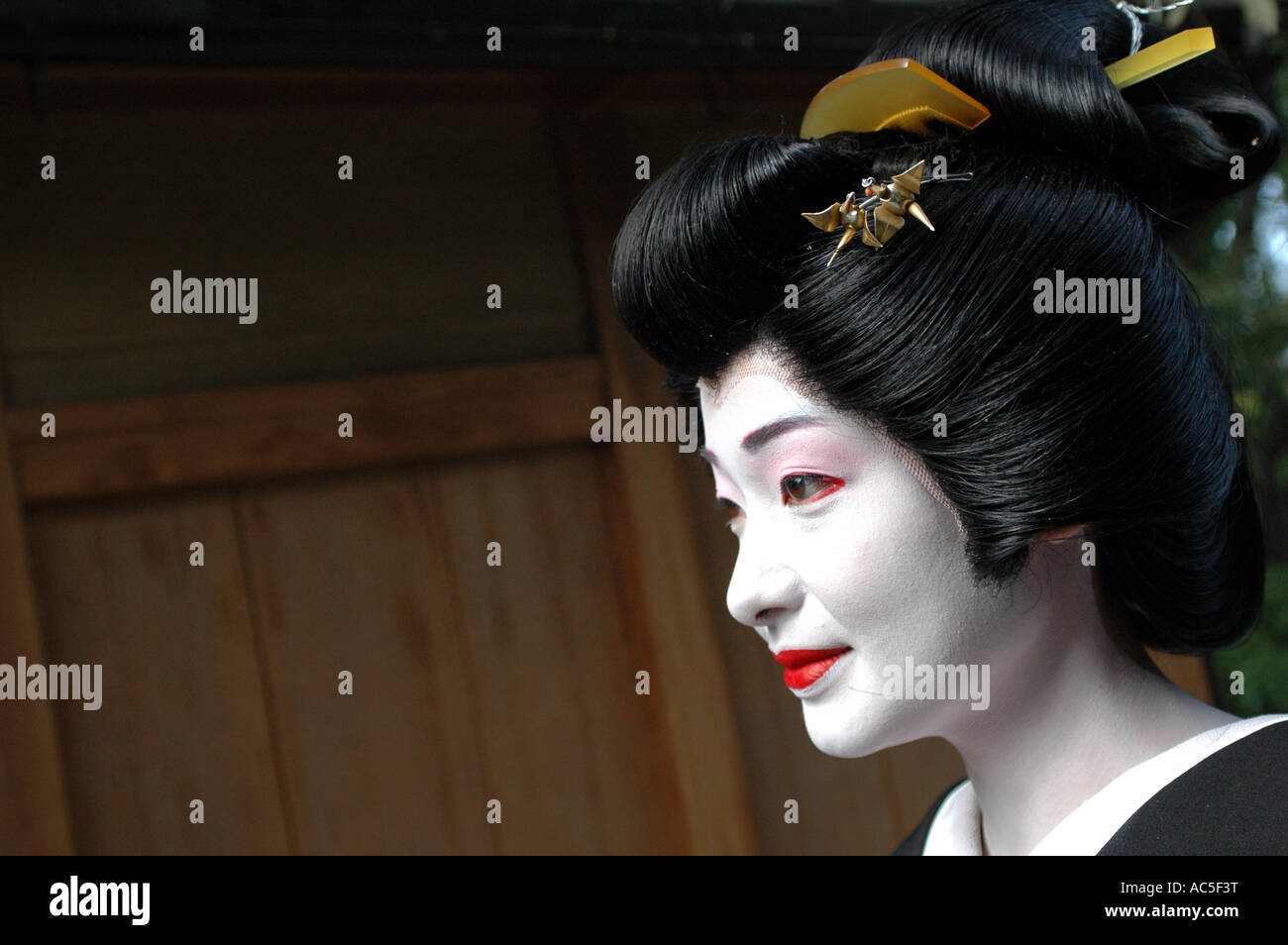 A maiko trainee geisha in the Gion district in Kyoto, Japan Stock Photo ...