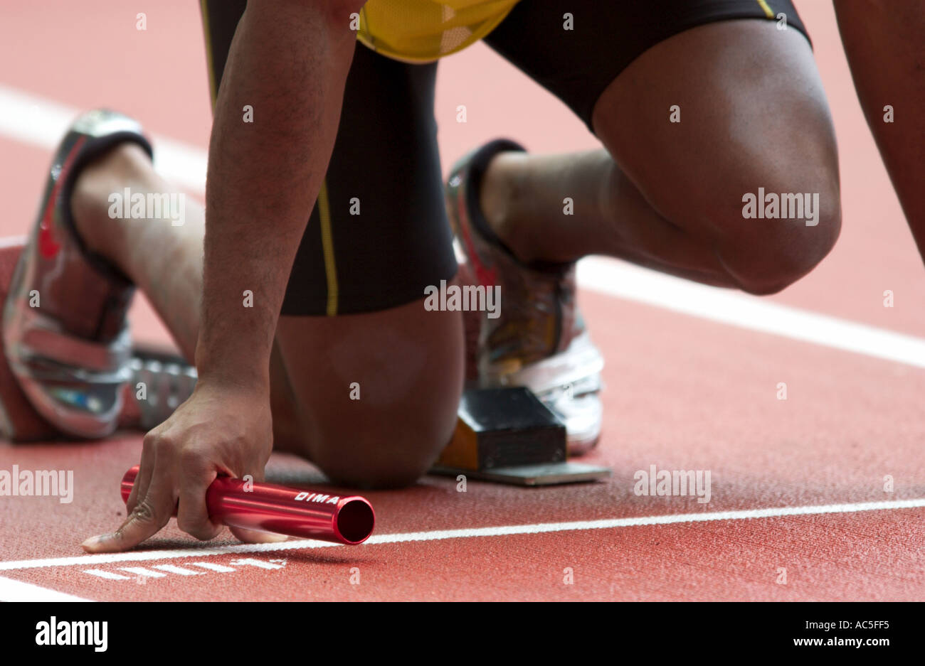 close up of runner in a relay race at the start Stock Photo - Alamy