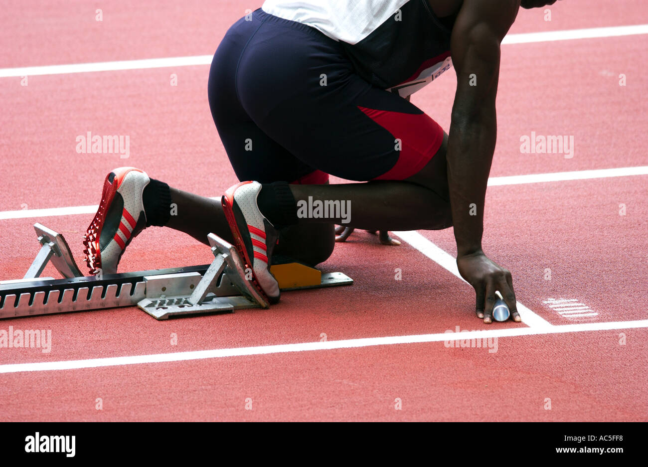 close up of runner in a relay race at the start Stock Photo - Alamy