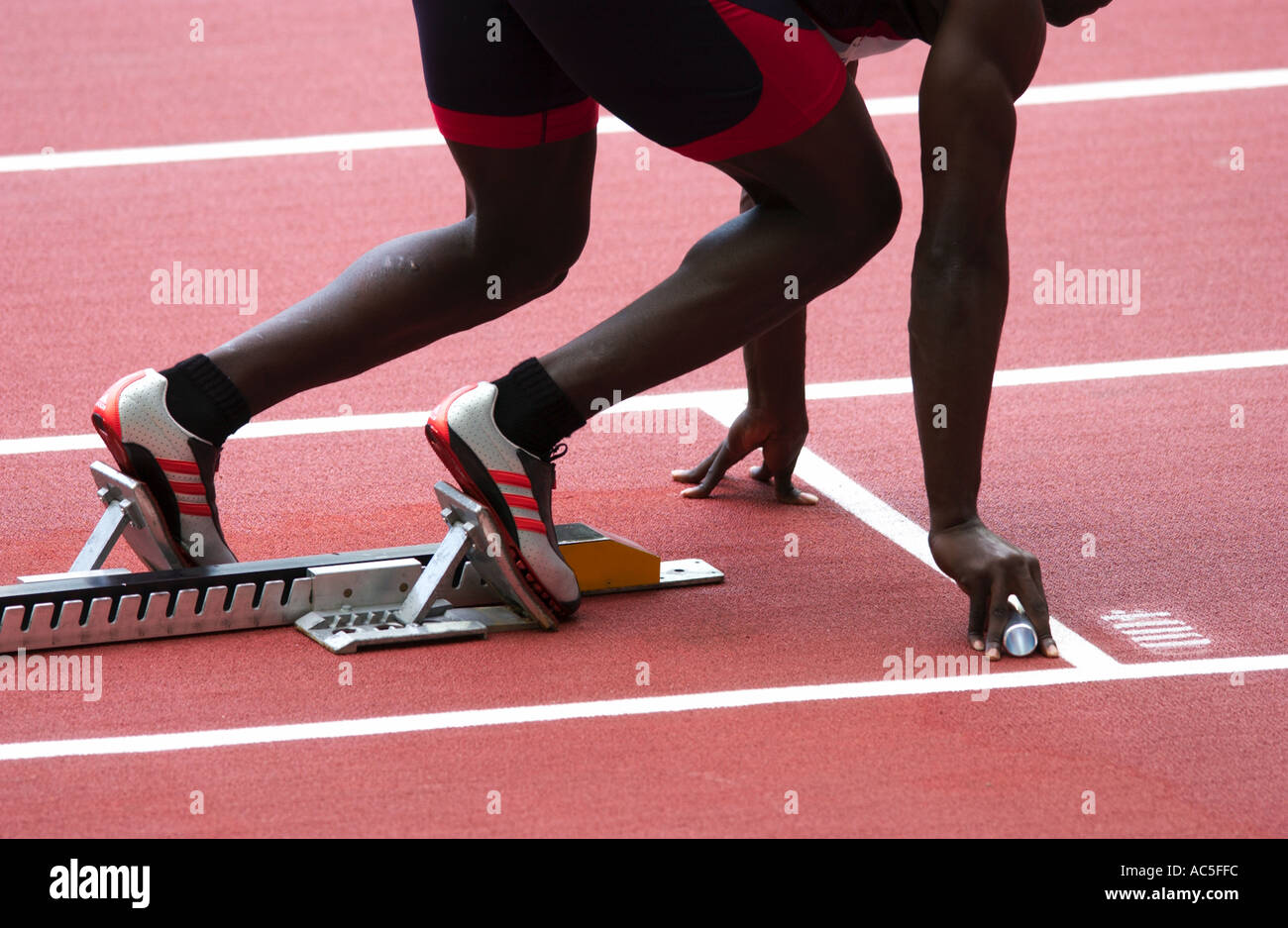 close up of runner in a relay race at the start Stock Photo - Alamy