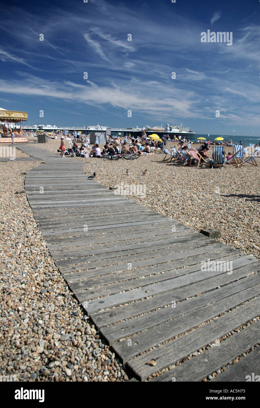 boardwalk, Brighton pebble beach and Brighton pier Stock Photo - Alamy