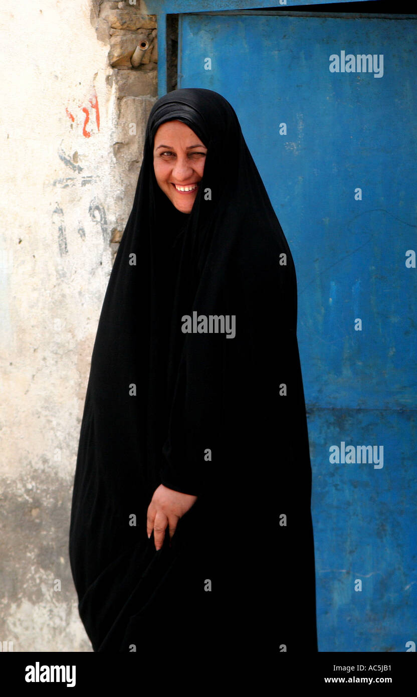 Iraq Basra 2005 A smiling Iraqi woman in front of her Basra home Stock ...