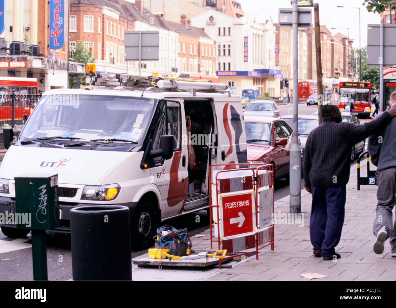 Bt public phone booth with advertising hi-res stock photography and ...