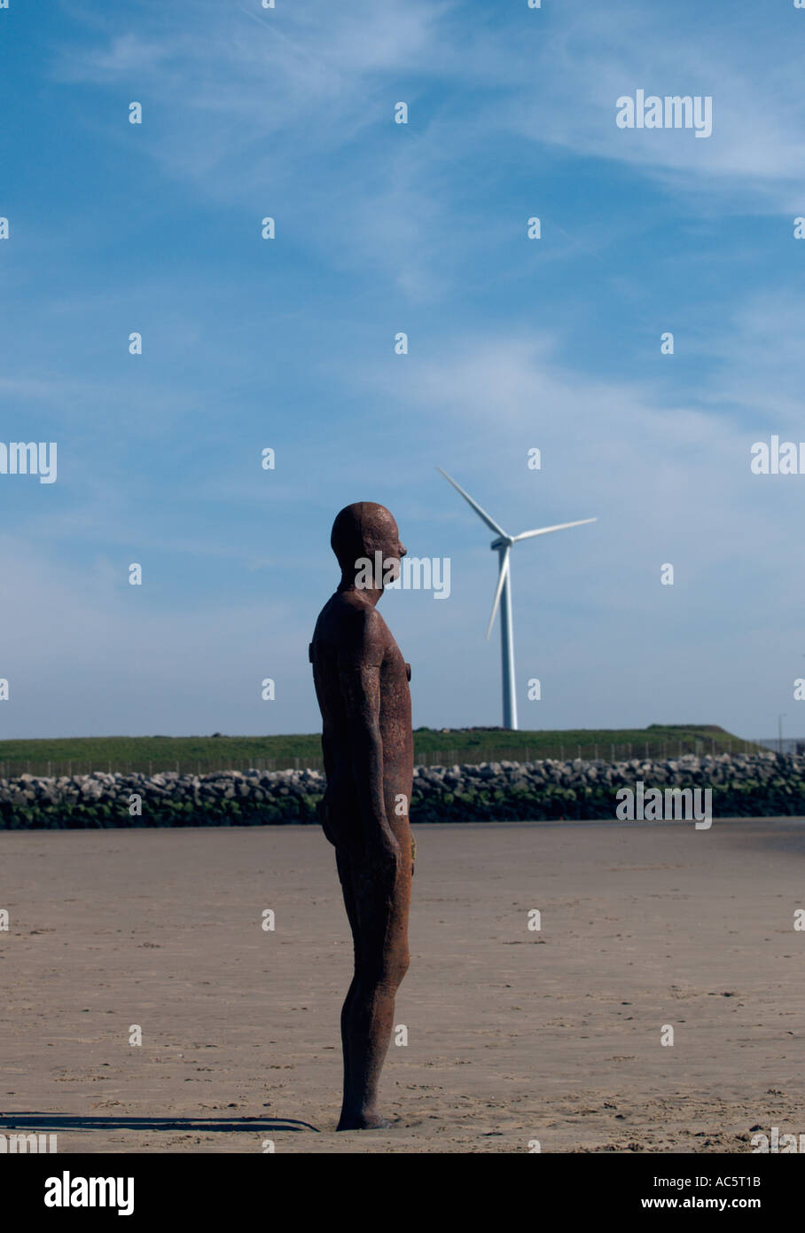 Antony Gormley statue at Crosby beach Stock Photo - Alamy