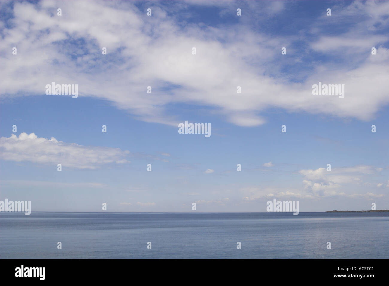 Clouds over water Stock Photo - Alamy