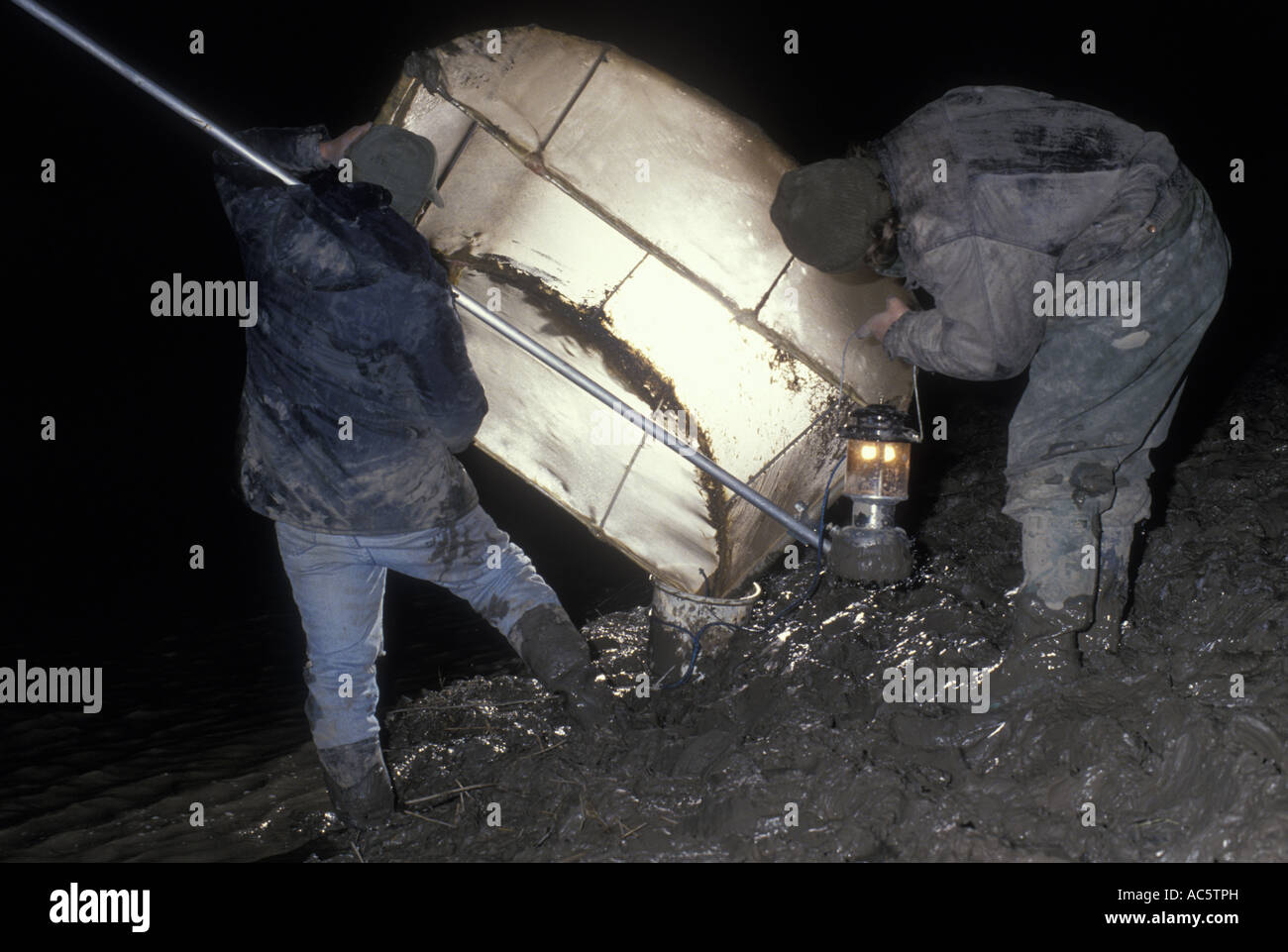 Elver fishing at night on the River Parrett near Bridgewater Somerset ...