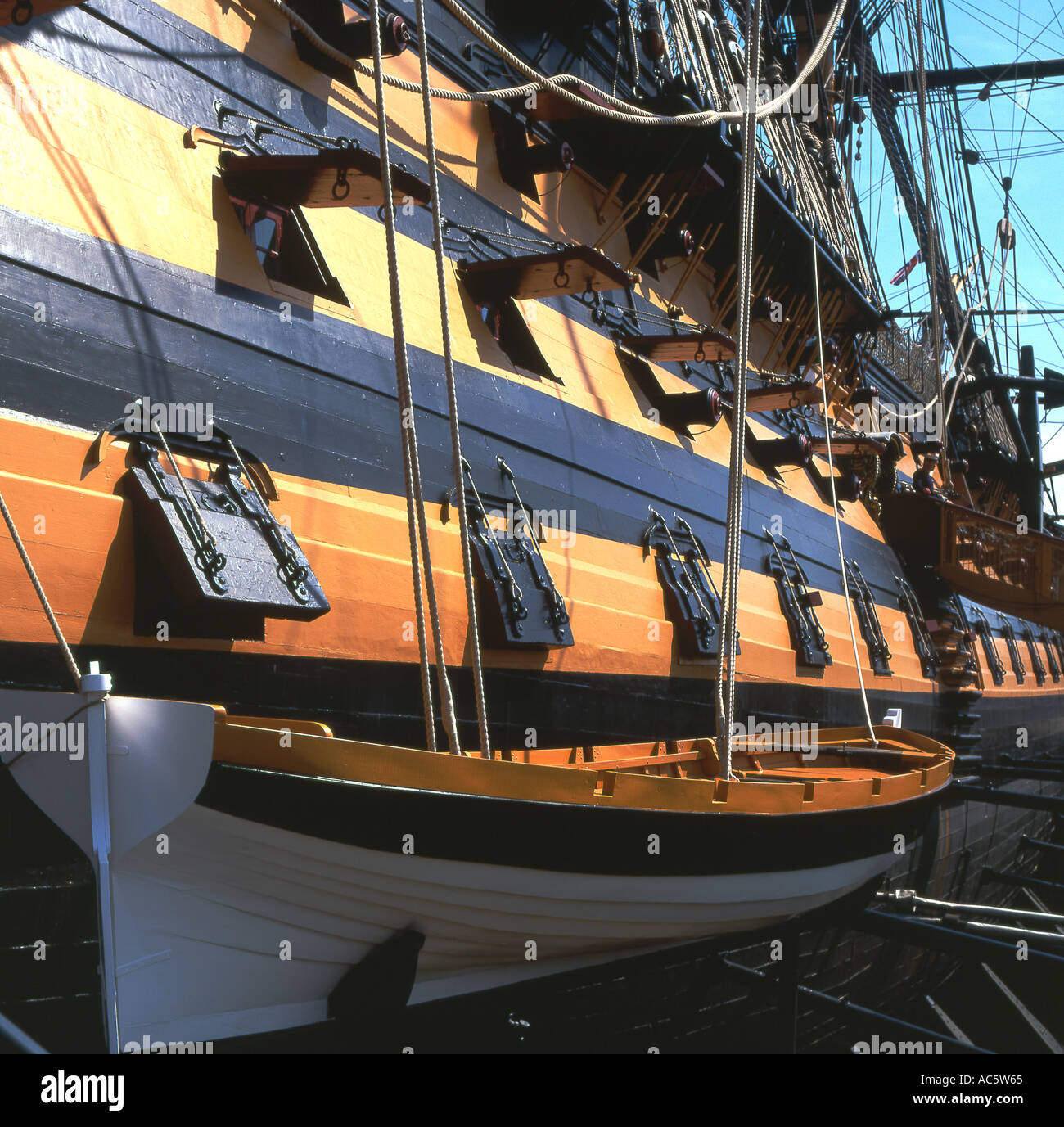 Longboat on side of HMS Victory at Historic Dockyard in Portsmouth ...
