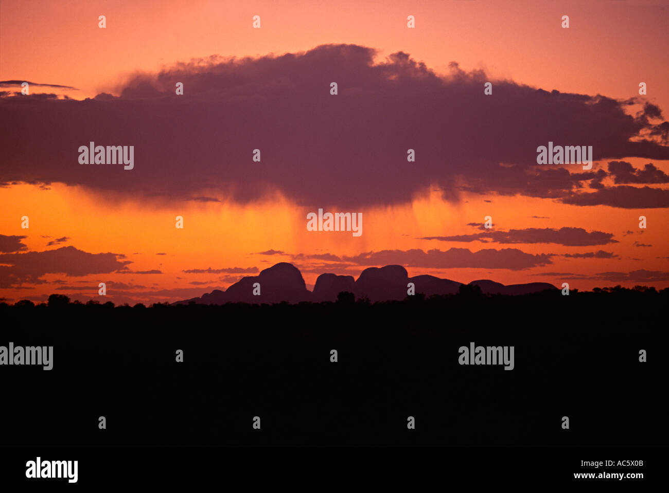 The Olga s rock formation in the outback of Australia at dusk with ...