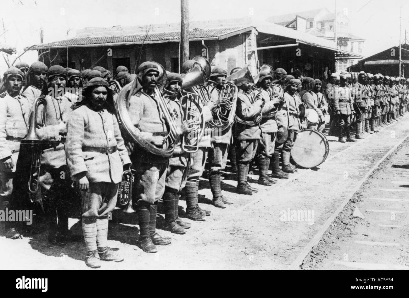 WW1 Turkish troops waiting to board a train at a railway station on the ...
