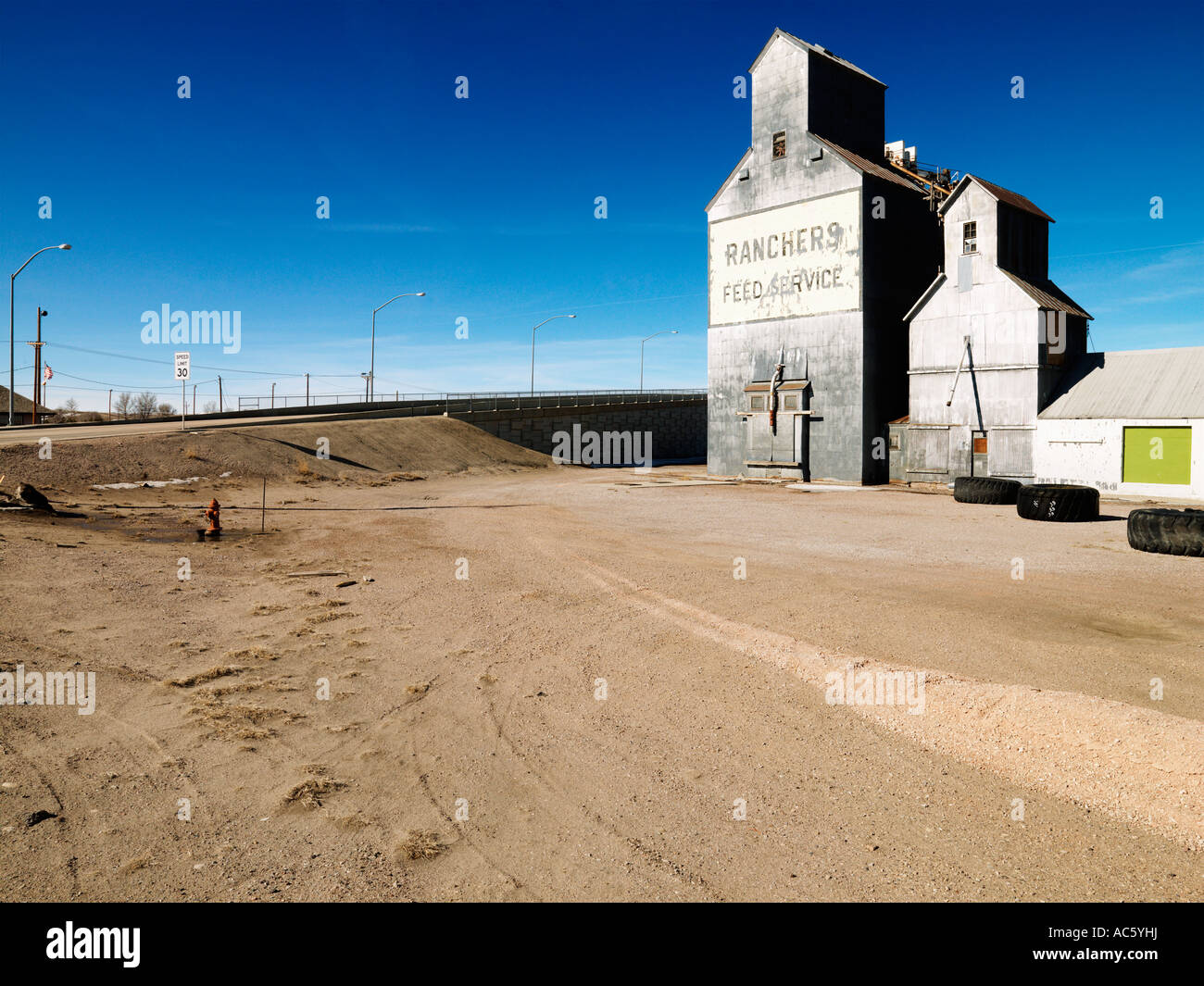Feed storage building in rural setting Stock Photo - Alamy