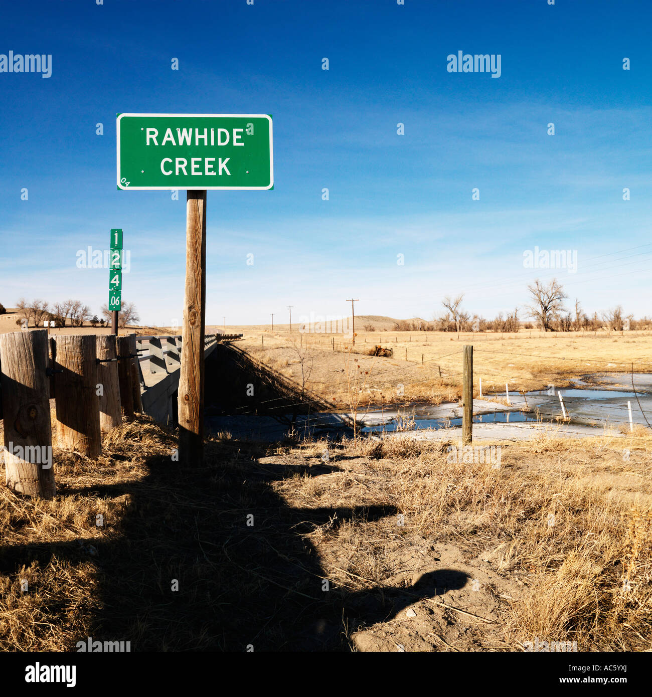 Rawhide creek sign in rural landscape Stock Photo - Alamy