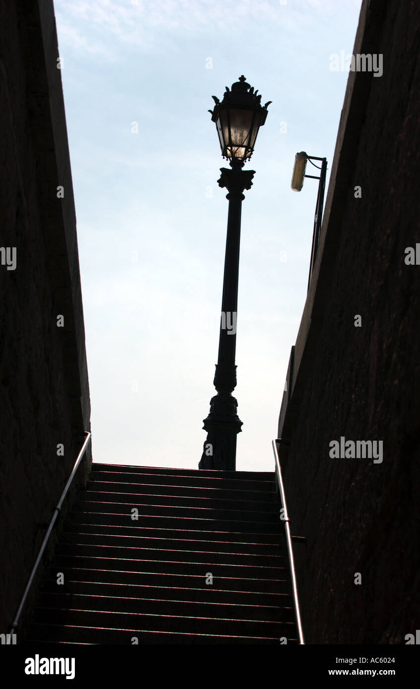 dark passageway , steps and street light in Paris France Stock Photo ...